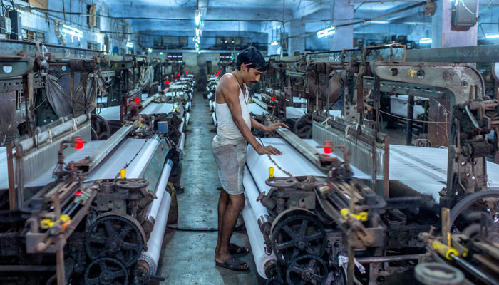 Manufacturing activity growth dips to 2-yr low